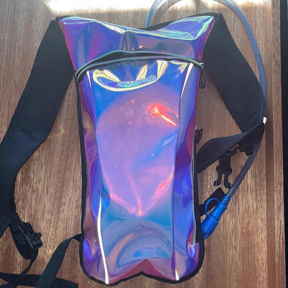 Bags | Rave Water Holding Backpack | Poshmark